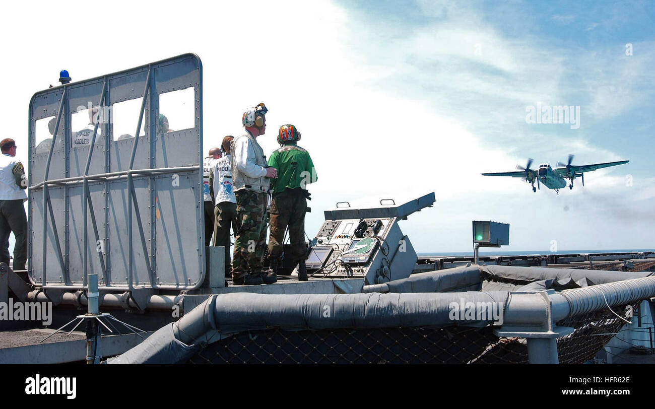 A Landing Signal Officer aboard the Nimitz-class aircraft carrier USS ...