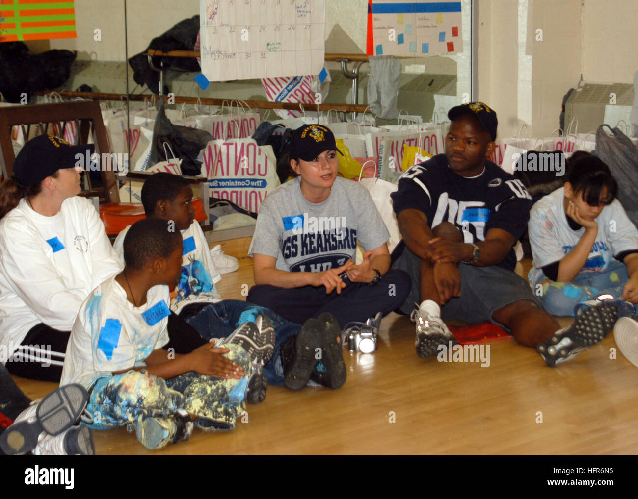 Sailors from USS Kearsarge, students, and non-profit personnel ...