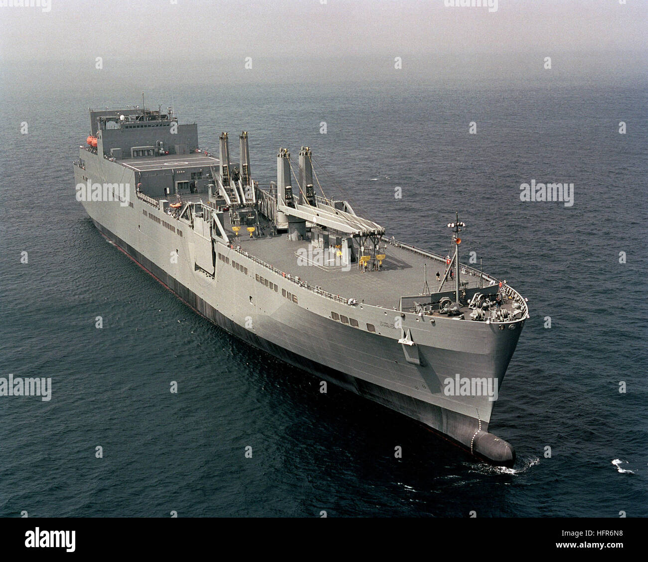 Aerial starboard bow view of the MSC (Military Sealift Command) strategic heavy lift ship USNS ...