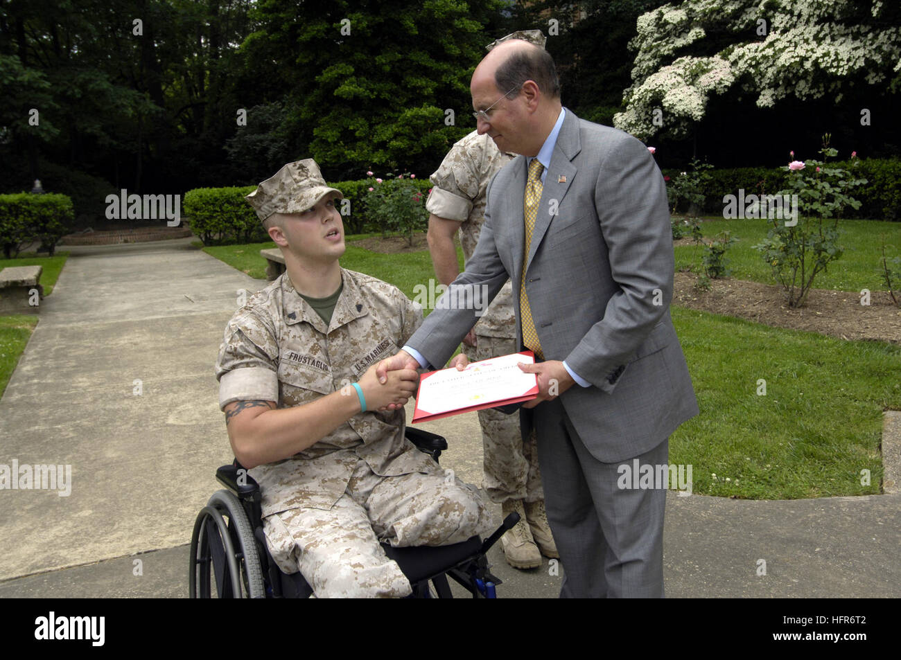 A U.S. Marine Corps corporal is awarded the Bronze Star with combat ...