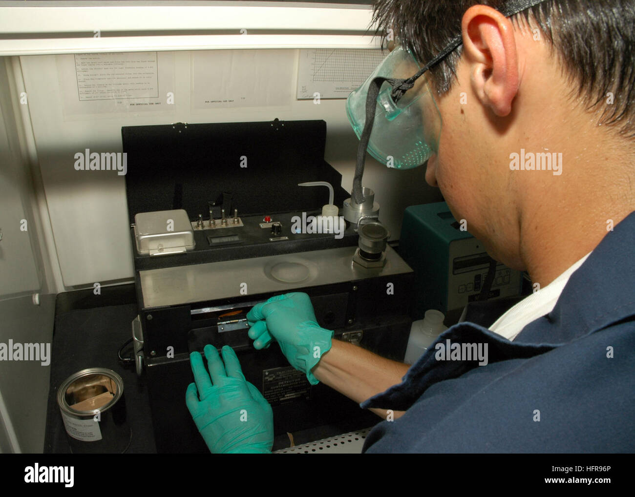 Aviation Boatswain's Mate Fuel tests fuel samples with the Combined ...