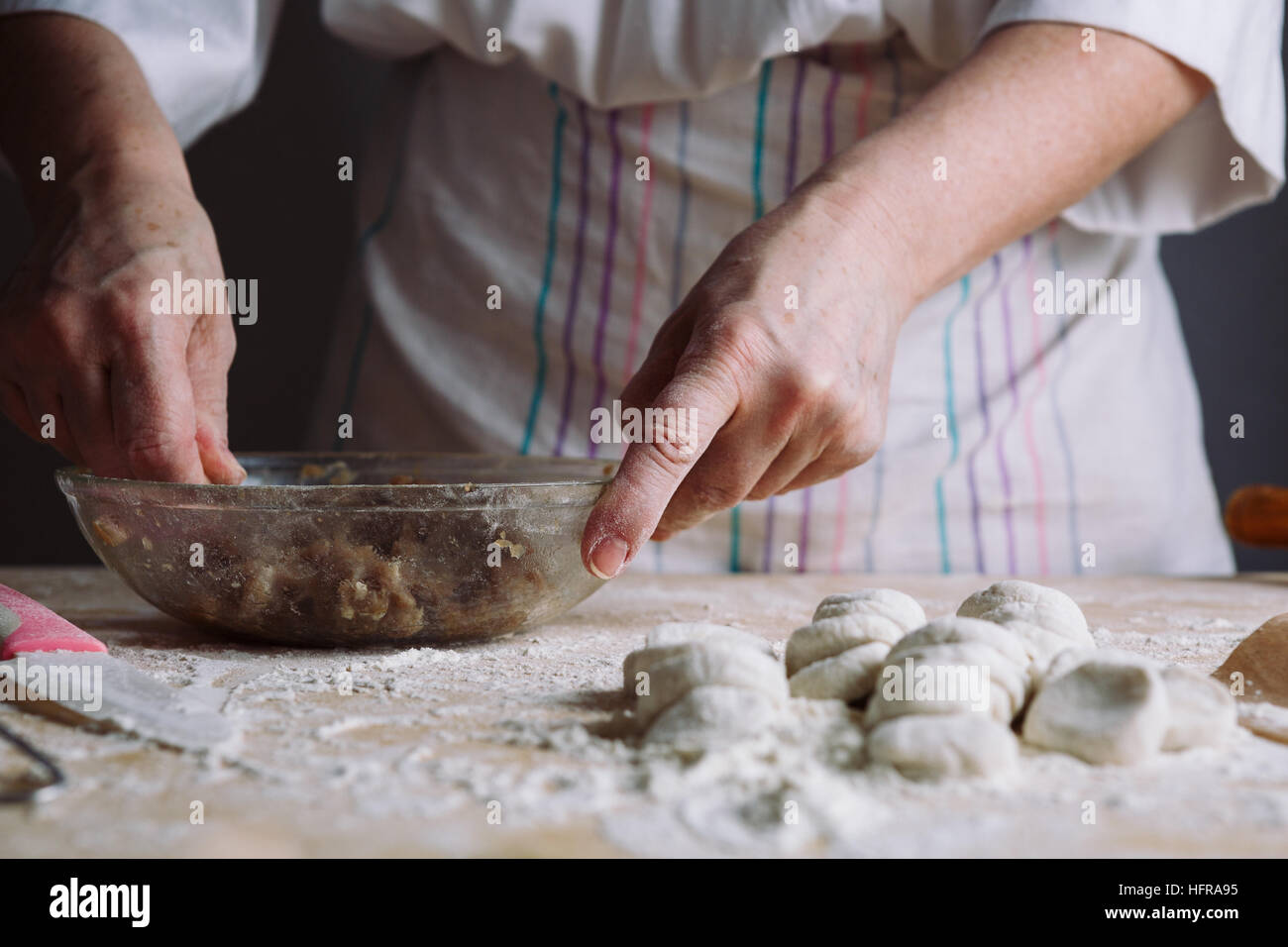 Two hands making meat dumplings Stock Photo - Alamy