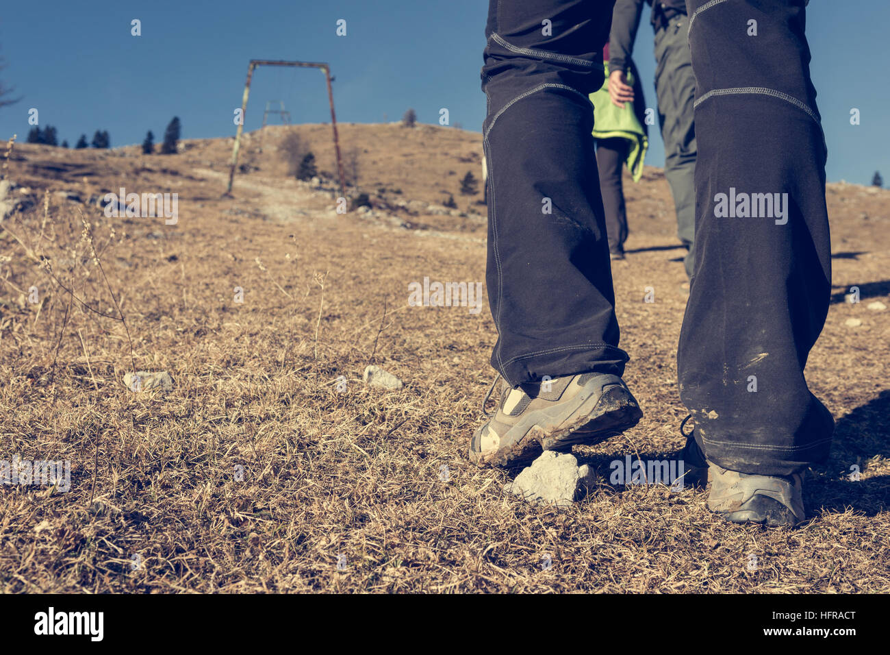 Closeup of female legs hiking in nature Stock Photo - Alamy