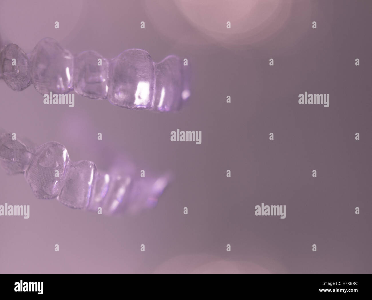 Transparent dental orthodontics for adults and children Stock Photo - Alamy
