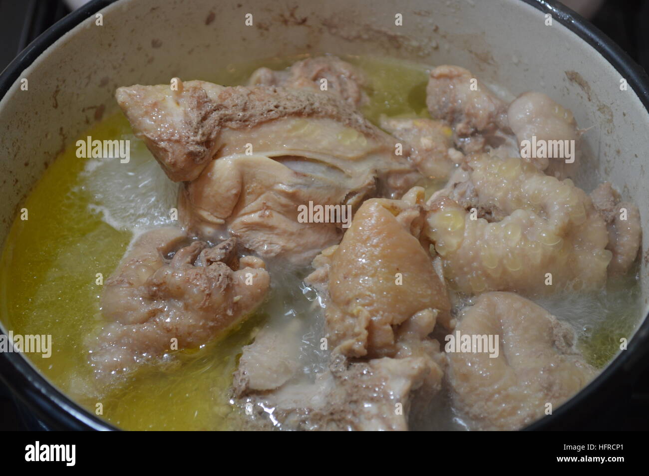 Cooking food on the stove Stock Photo - Alamy