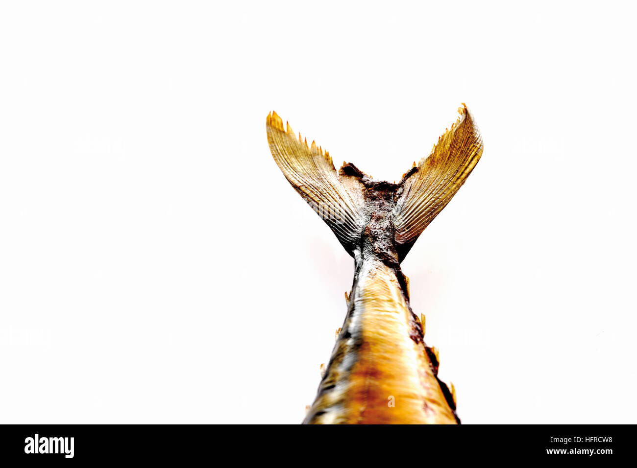 Smoked mackerel, tail fins Stock Photo - Alamy