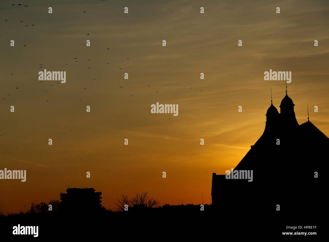 Building with towers at sunset Stock Photo - Alamy