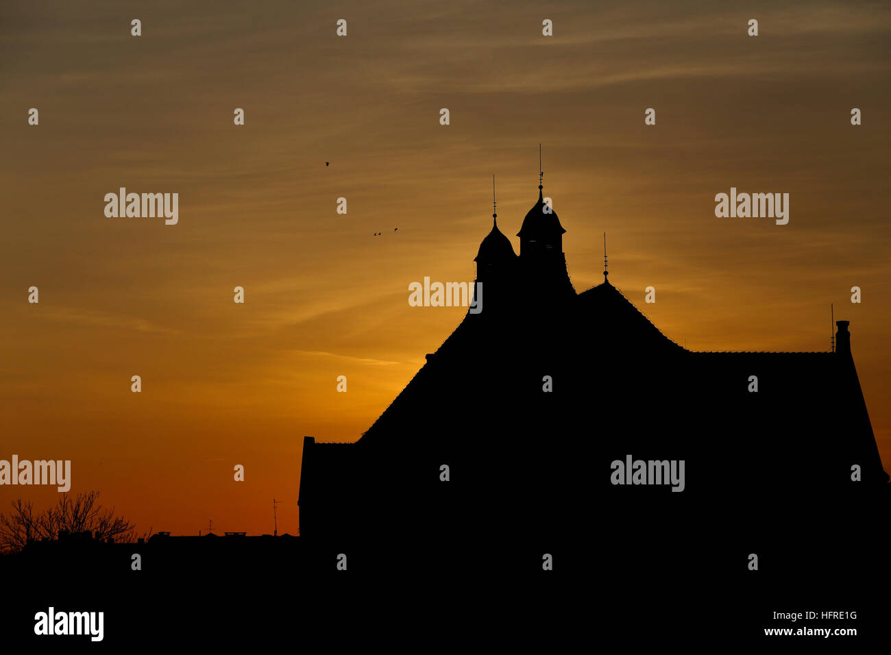 Building with towers at sunset Stock Photo - Alamy