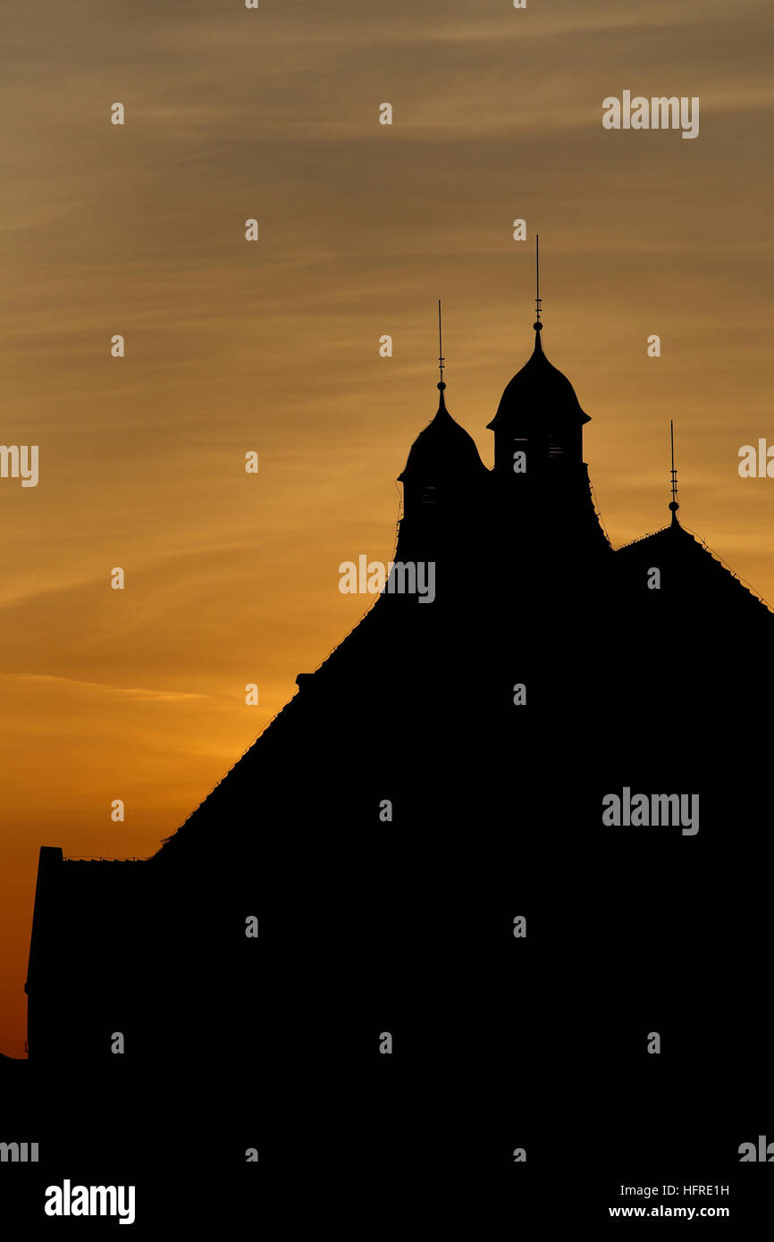 Building with towers at sunset Stock Photo - Alamy