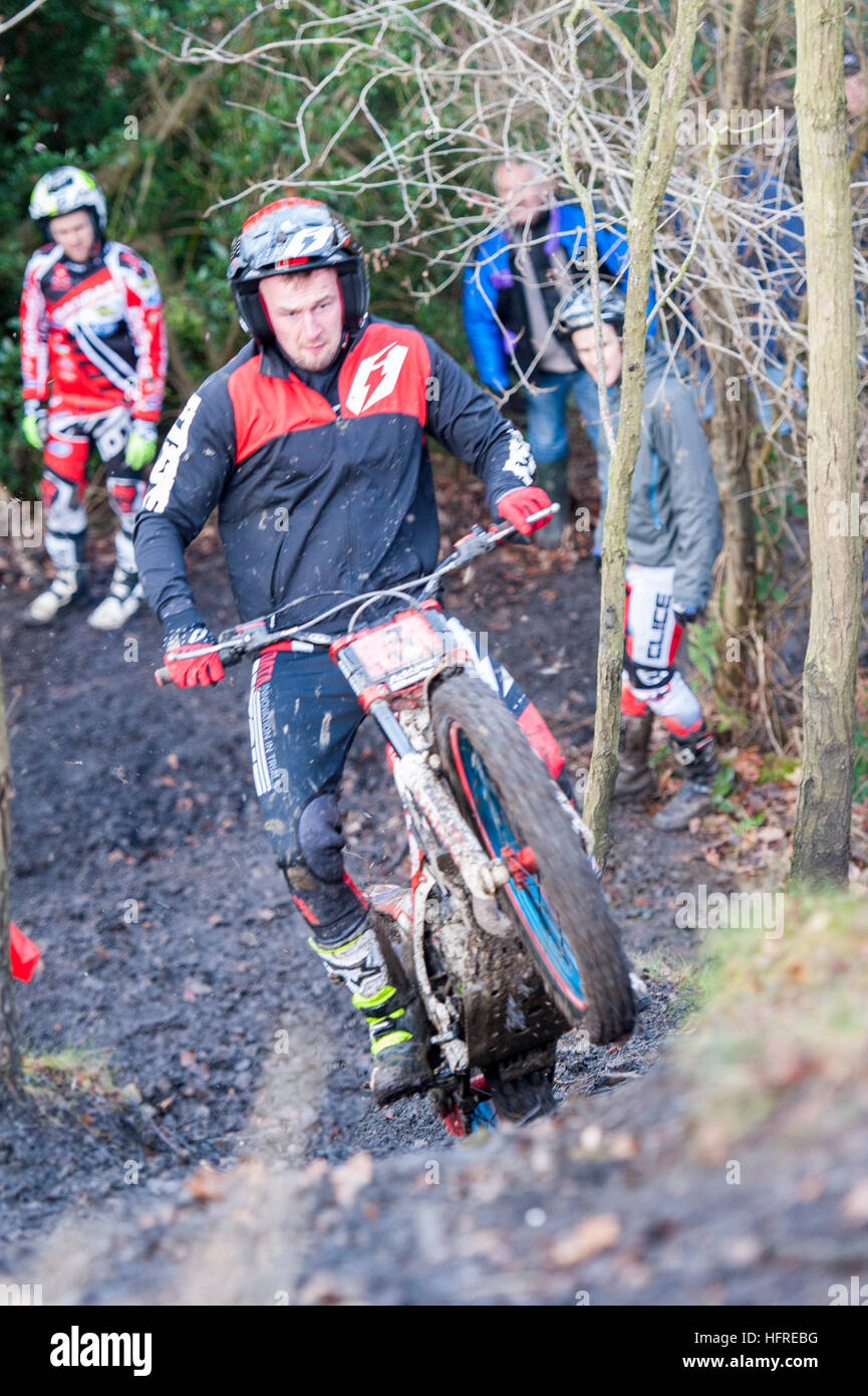 motorcycle trial riders enjoy riding in the local woodland in ...
