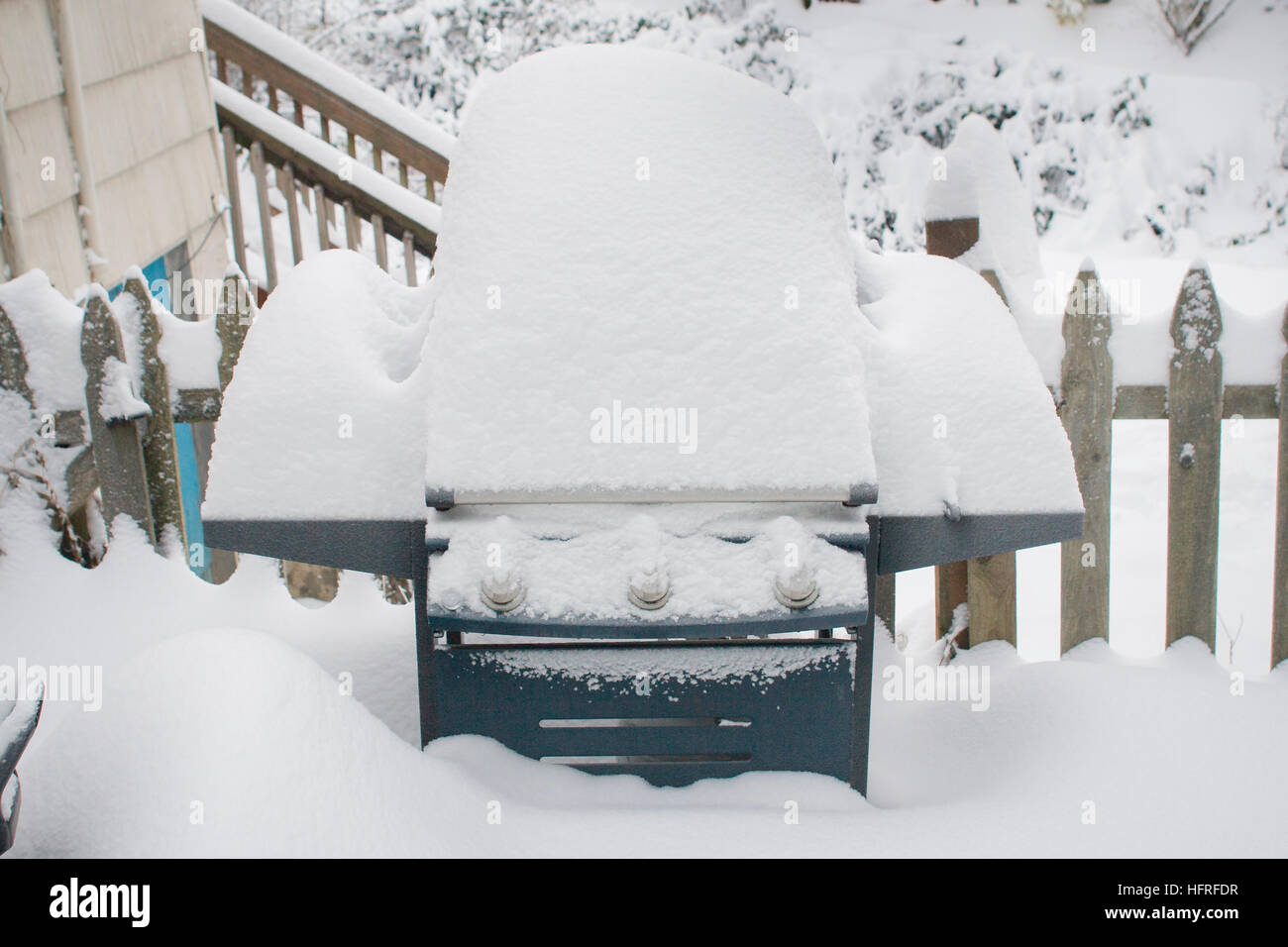 Not the best time to fire up the grill...(barbecue grill covered in ...