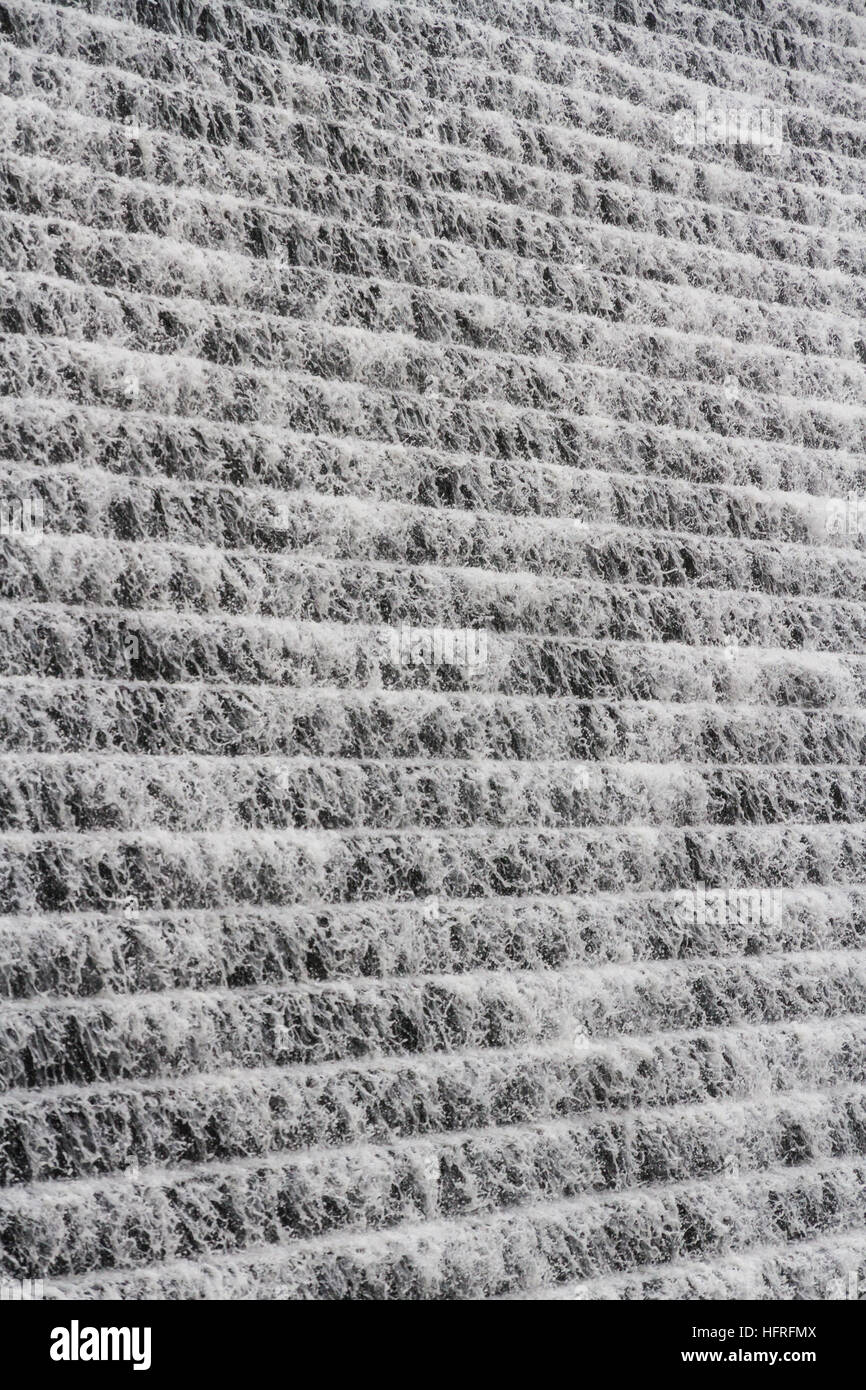 Avon Dam with water flowing down making a background. Dartmoor, Devon ...