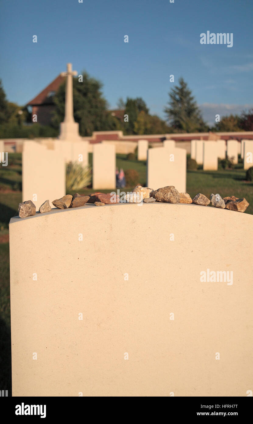 Following Jewish practice, small stones on a headstone, in the ...
