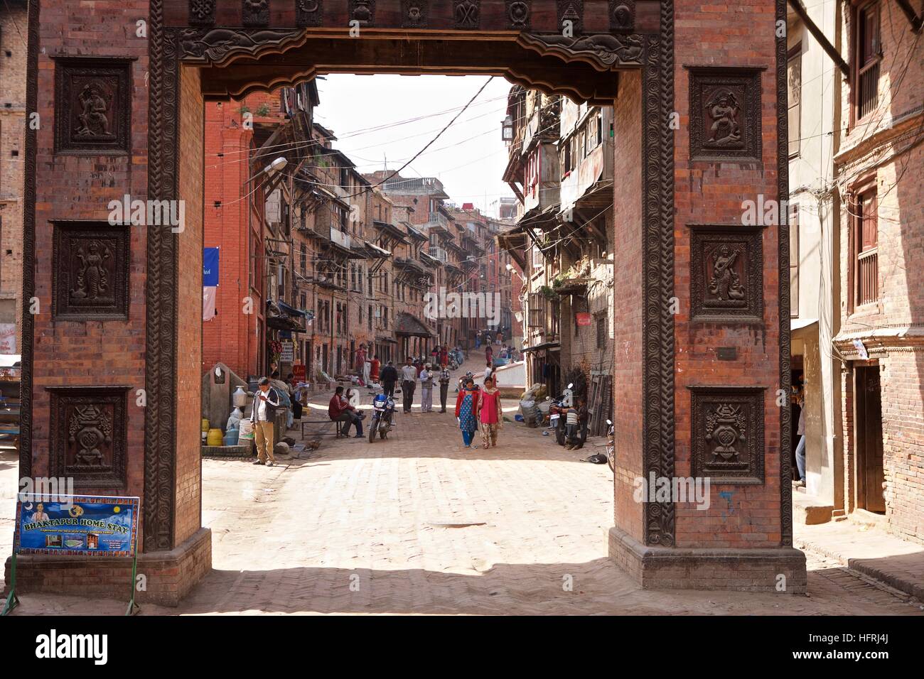Nepal Kathmandu Asia Bhaktapur city gate historic street scene candid ...