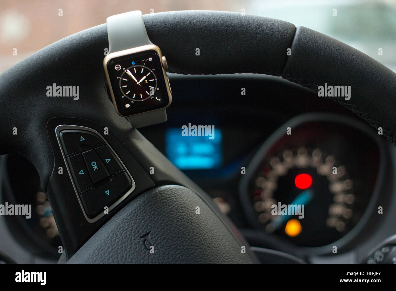 Modern car interior with smart watch in steering wheel Stock Photo - Alamy