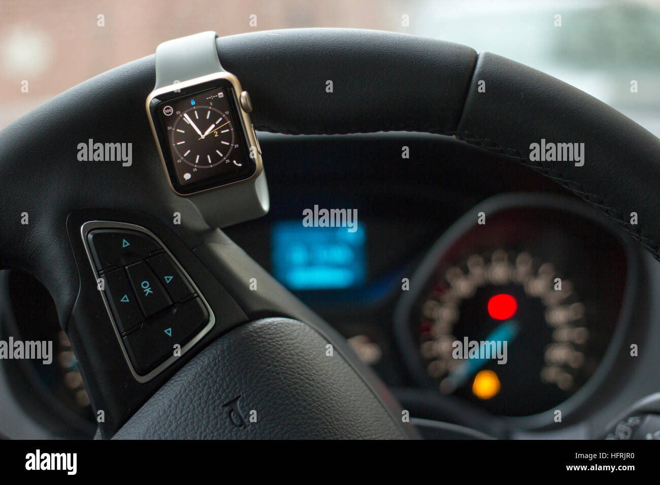 Modern car interior with smart watch in steering wheel Stock Photo - Alamy