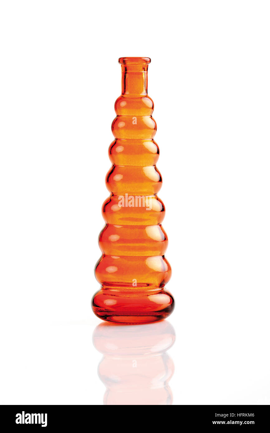 Orange glass bottle Stock Photo - Alamy