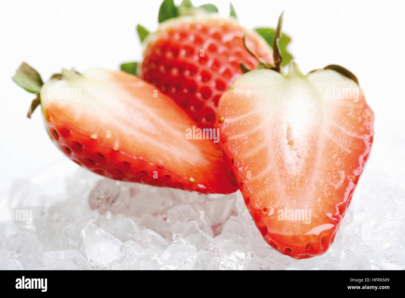 Strawberries on ice cubes Stock Photo - Alamy
