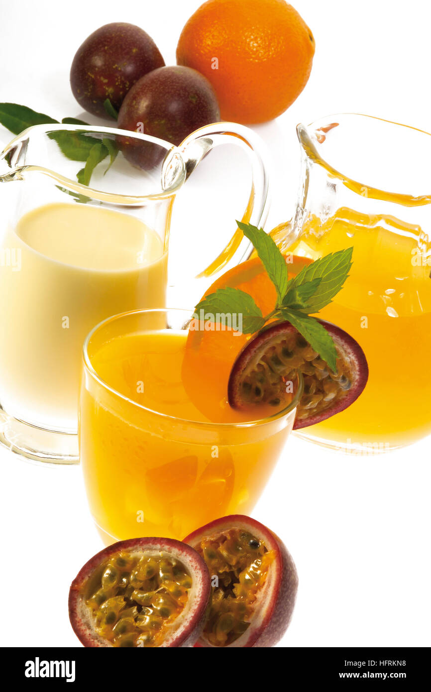 Orange-passion fruit juice and milkshake with fresh oranges and passion ...
