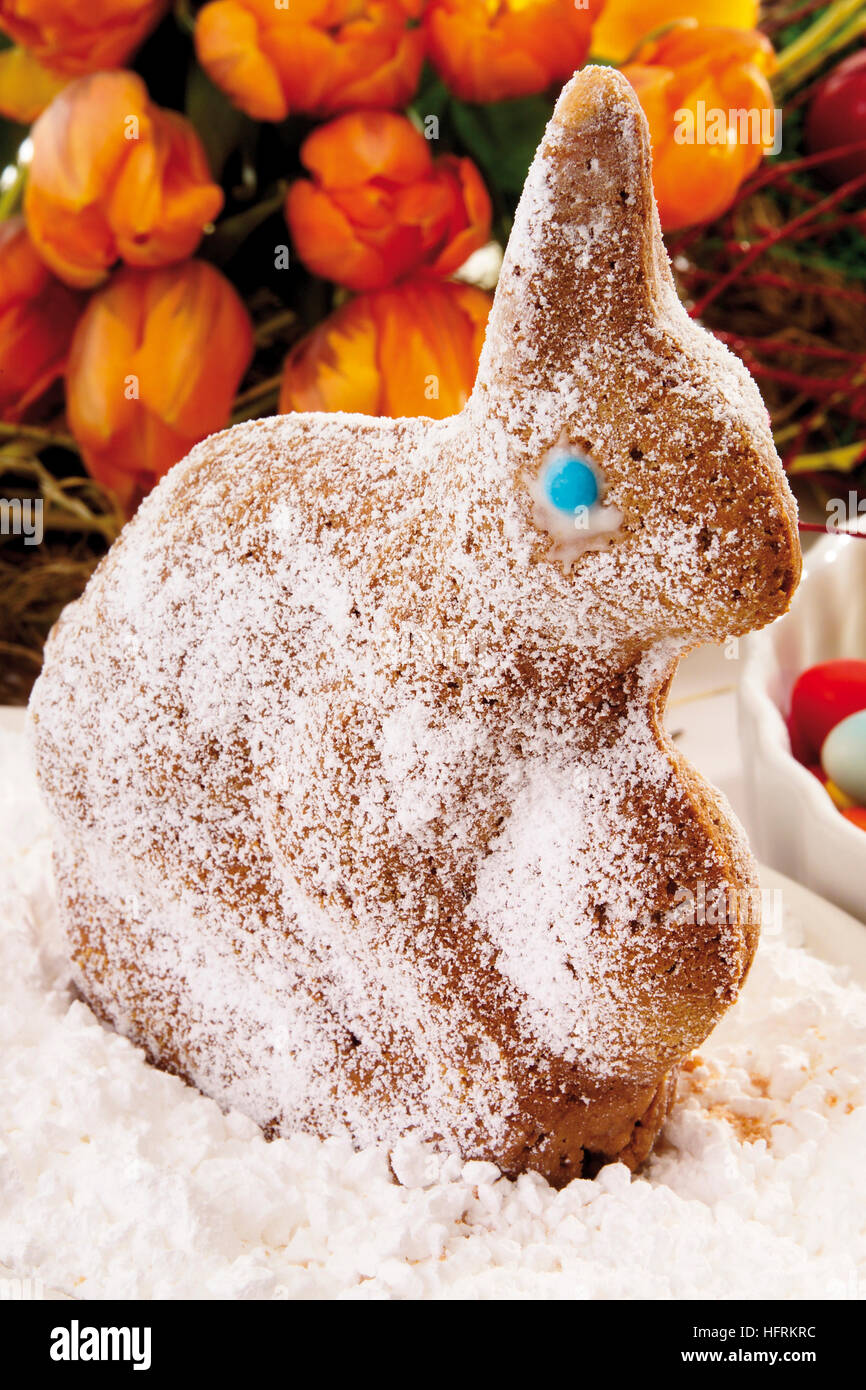 Easter bunny made of dough, sprinkled with icing sugar Stock Photo - Alamy
