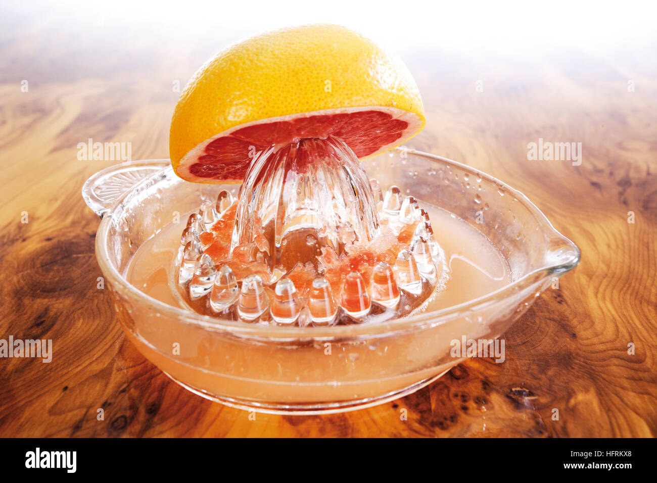Squeezing grapefruit juice hi-res stock photography and images - Alamy