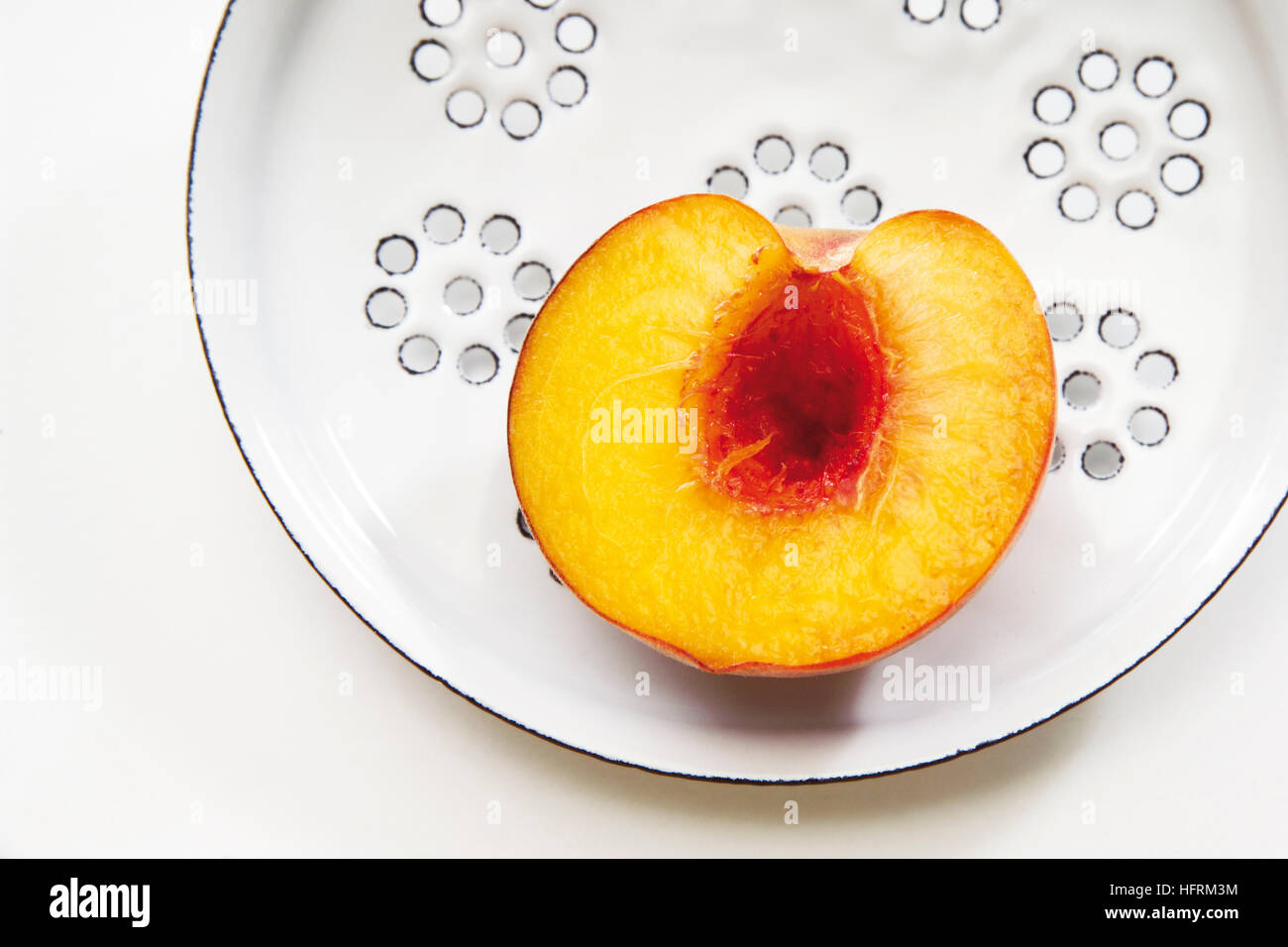 Peach cut in half cutout hi-res stock photography and images - Alamy