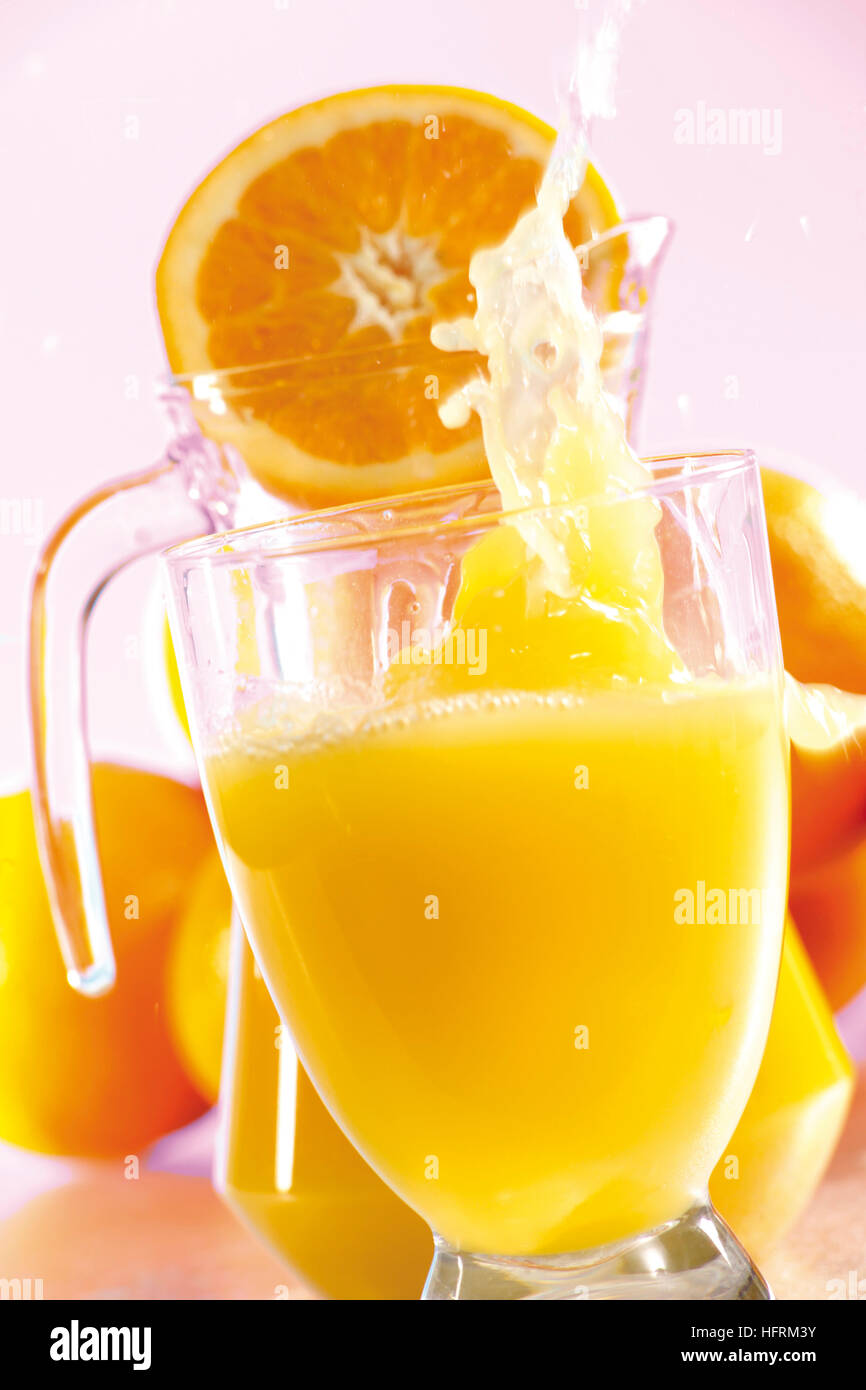Orange juice, splash Stock Photo - Alamy