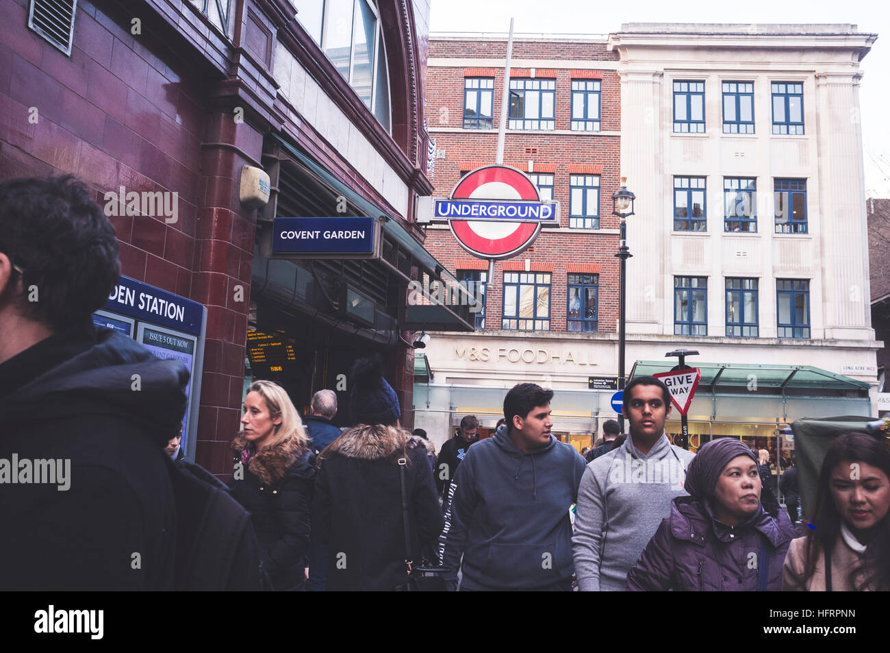 Pedestrians outside entrance to Covent Garden underground station in ...