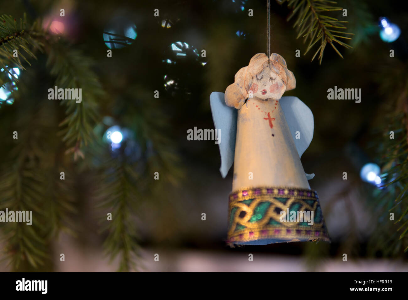 close up paper angel hanging on a christmas tree Stock Photo - Alamy