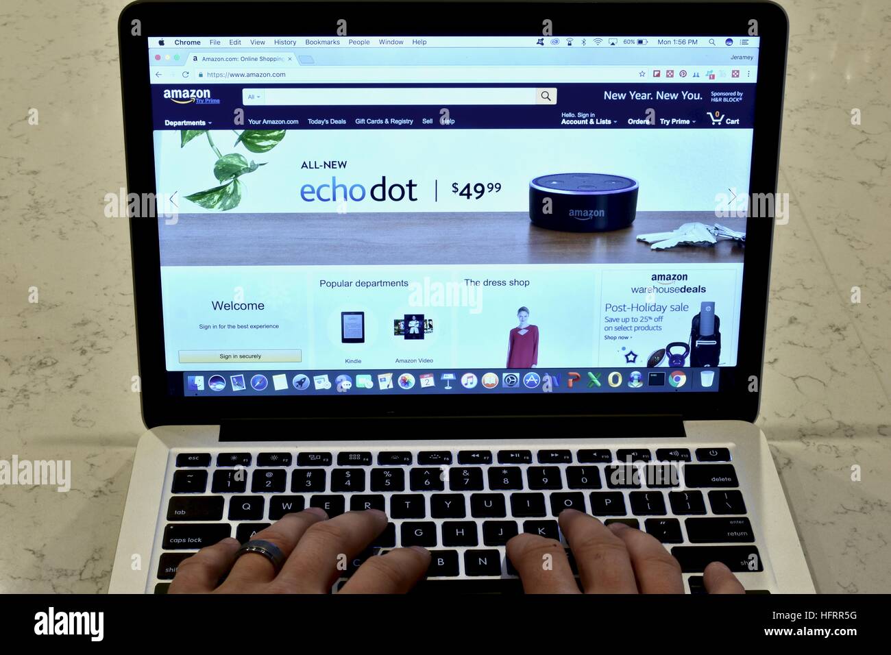 An Apple Macbook Pro displaying the Amazon webpage Stock Photo - Alamy