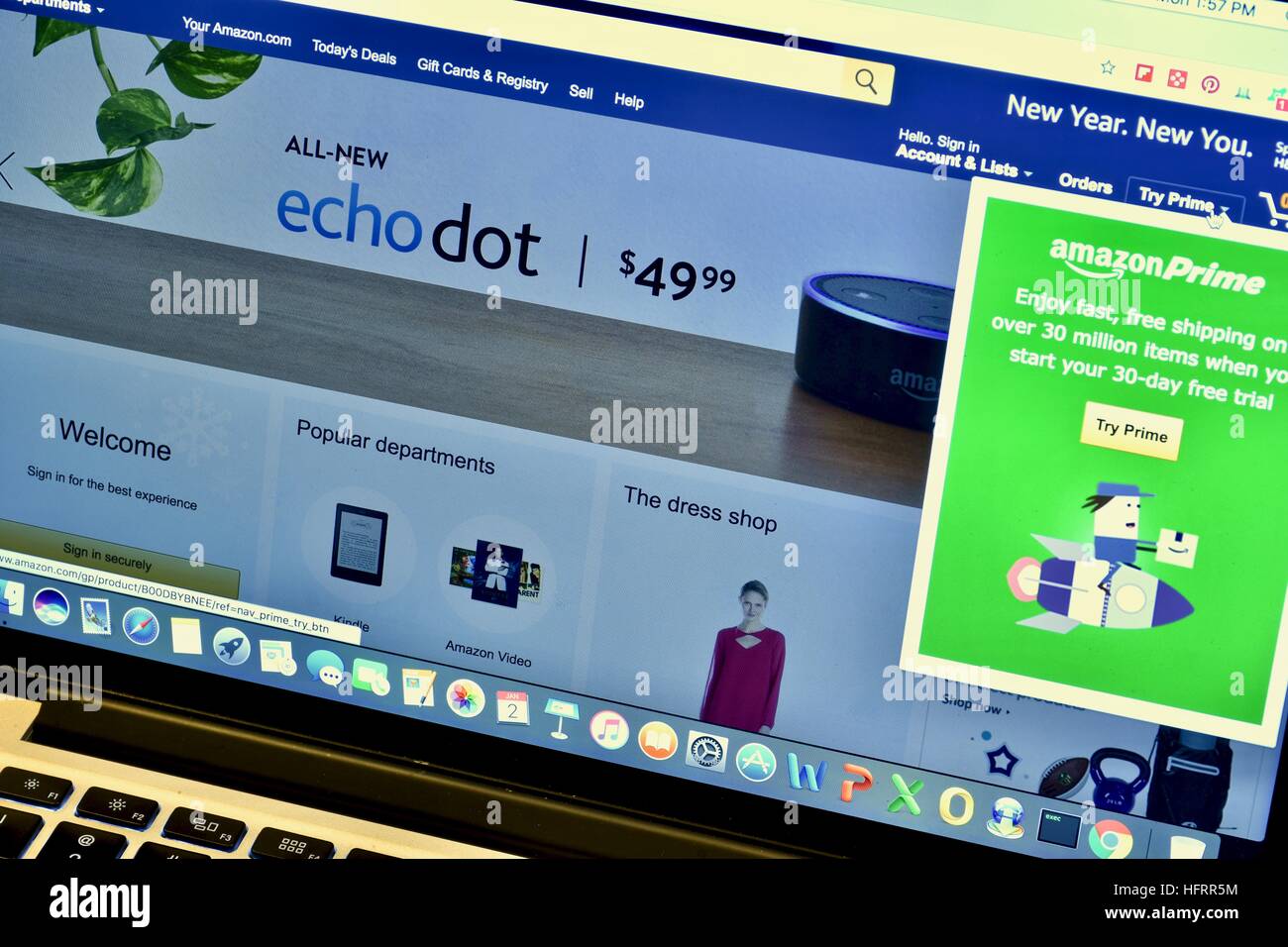 An Apple Macbook Pro displaying the Amazon webpage Stock Photo - Alamy