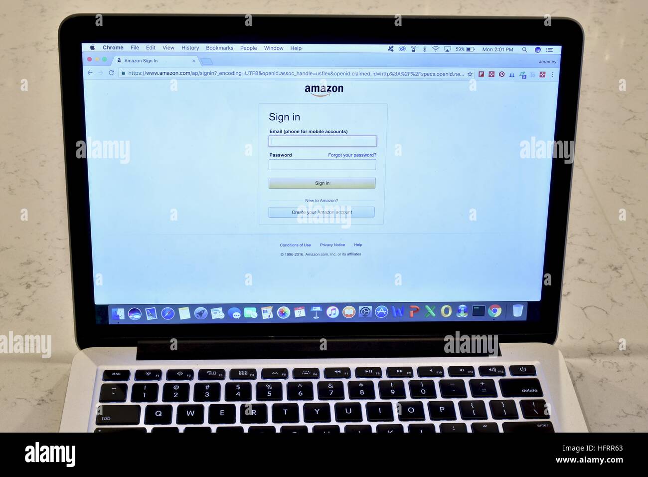 An Apple Macbook Pro displaying the Amazon webpage Stock Photo - Alamy