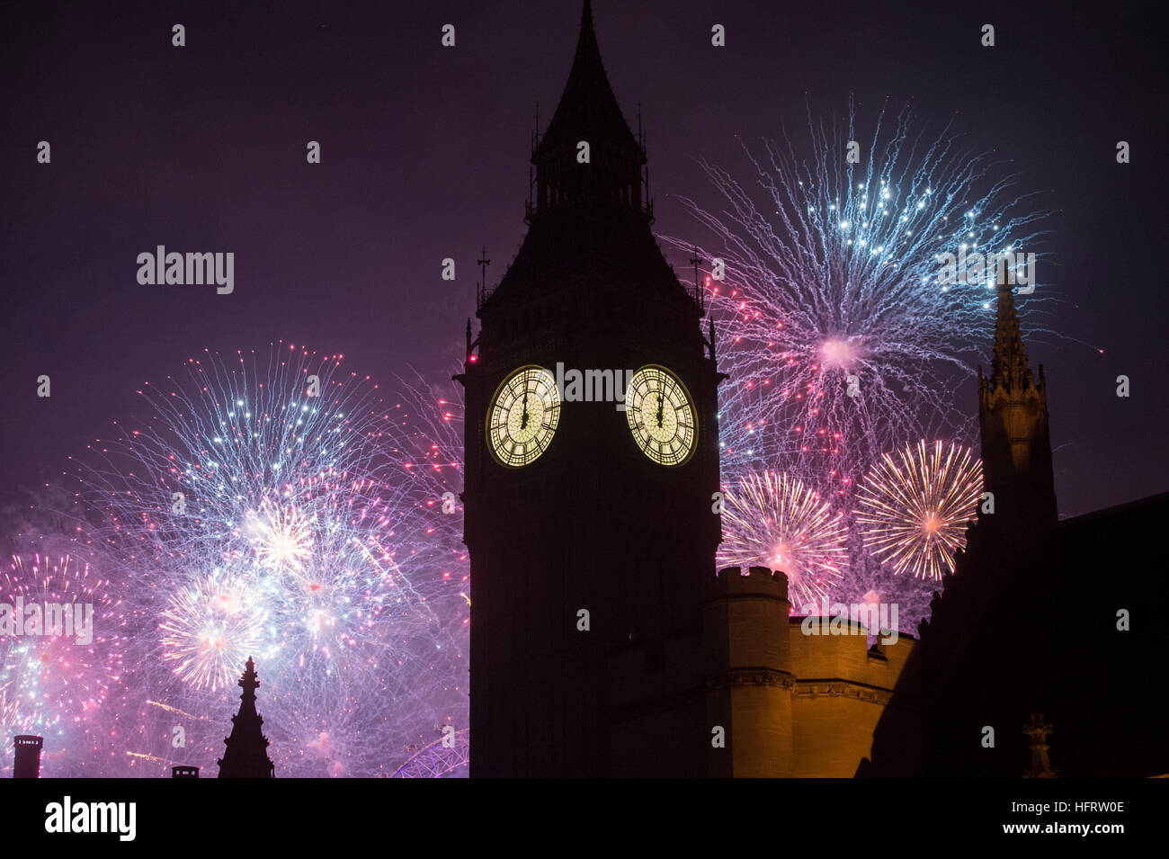Fireworks light up the sky over Parliament in central London during the ...