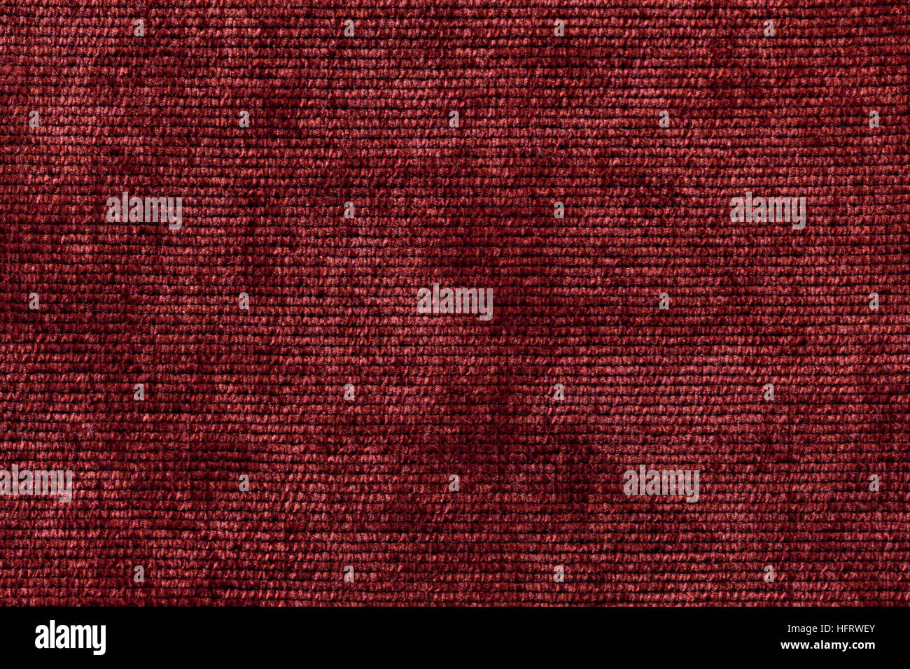 Dark red background from a soft textile material. sheathing fabric with ...