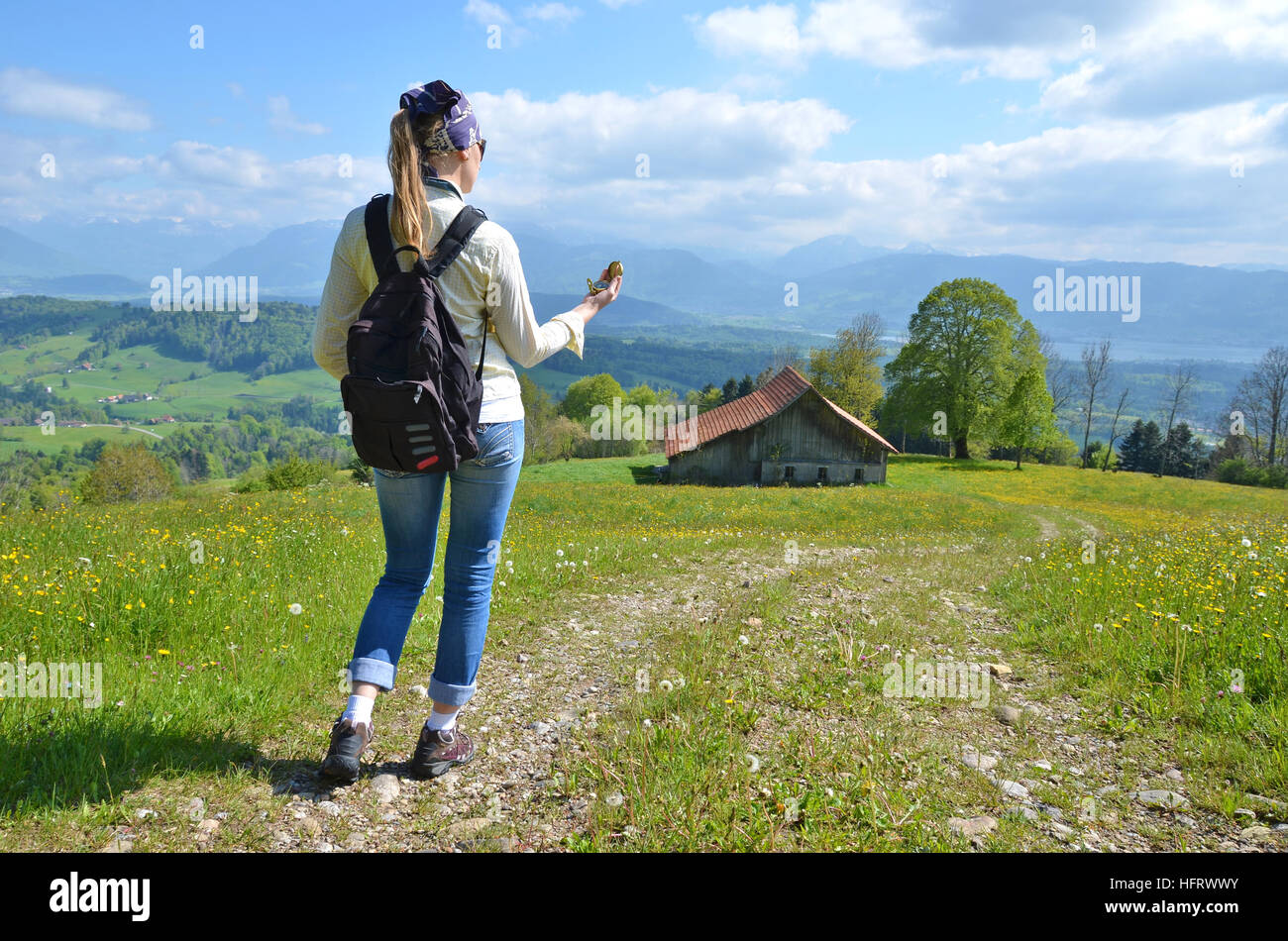 Traveler with a compass in the hand Stock Photo - Alamy