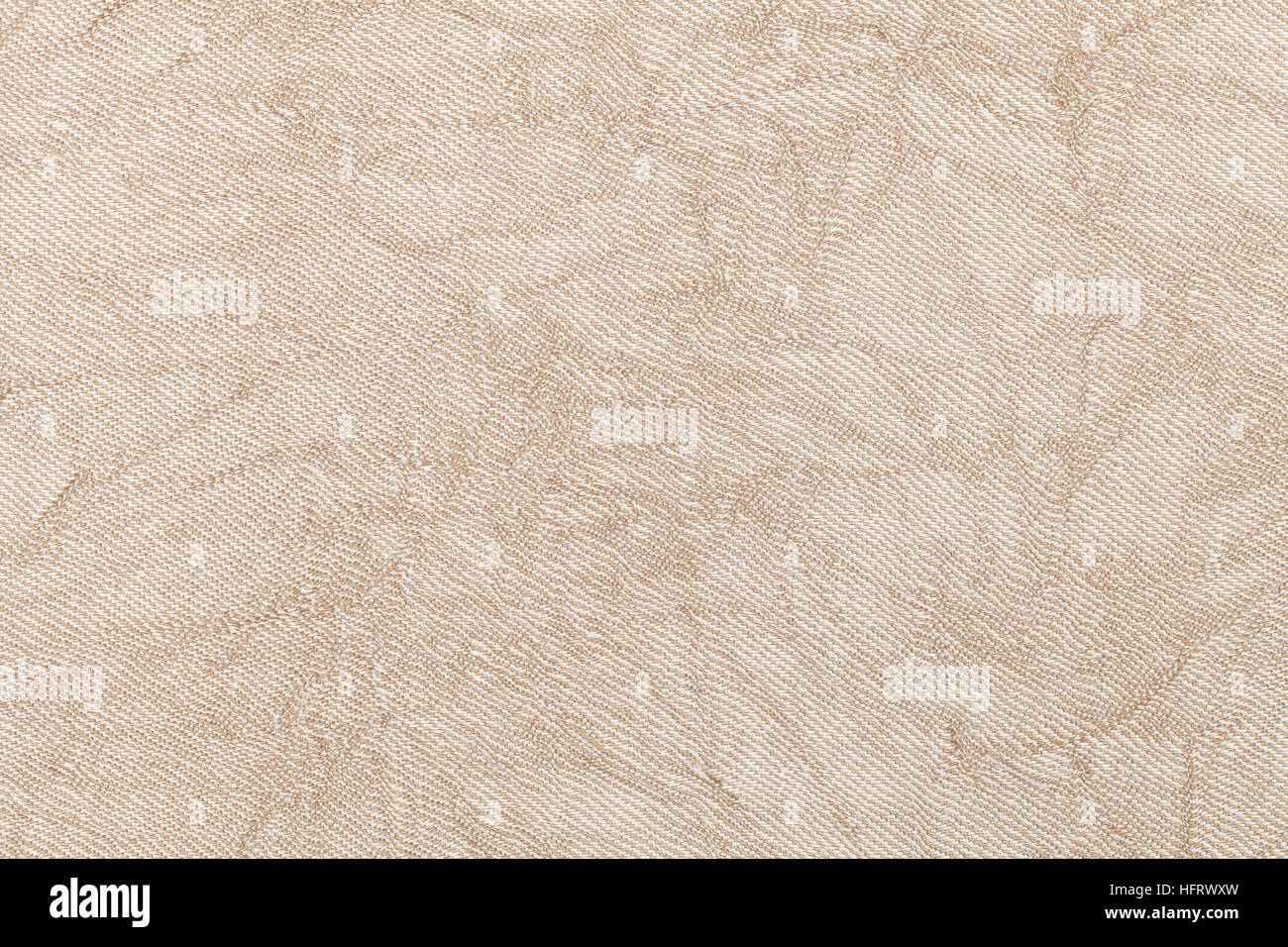 light beige wavy background from a textile material. Fabric with ...
