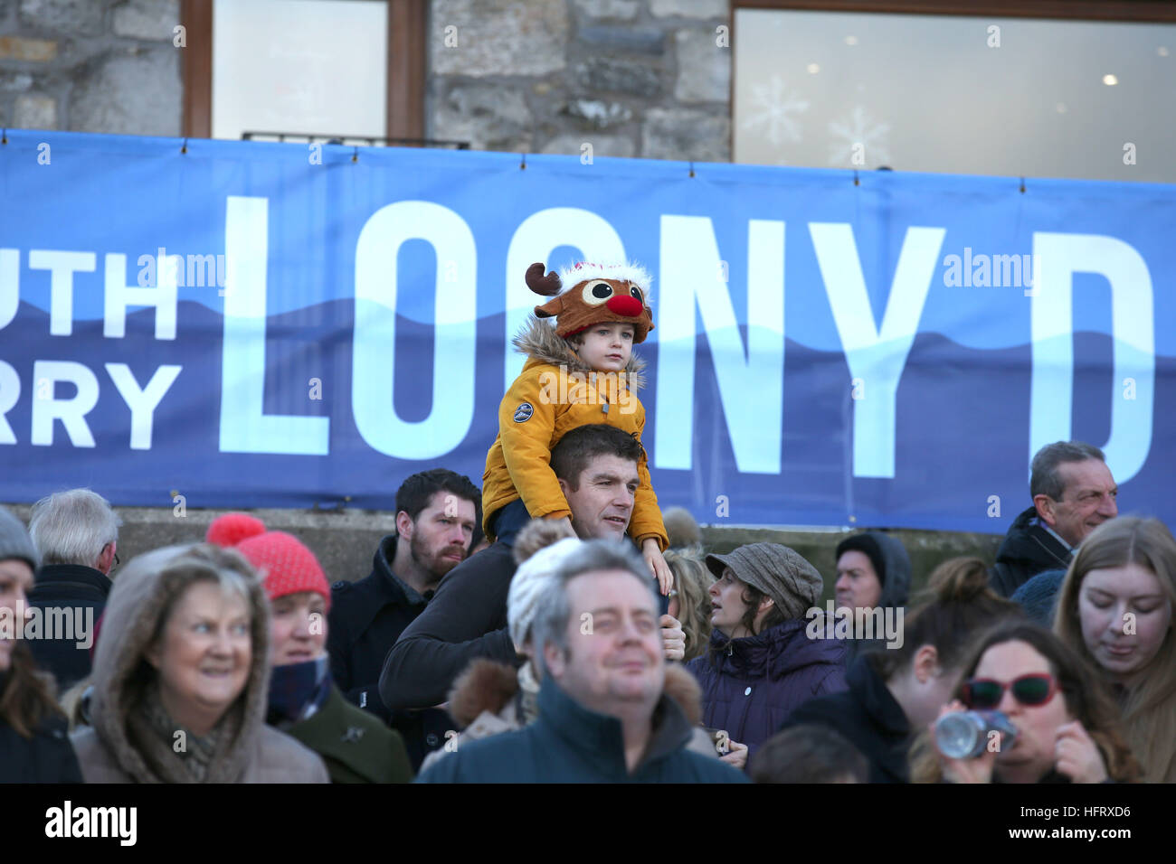 People attend the Loony Dook New Year's Day dip in the Firth of Forth ...