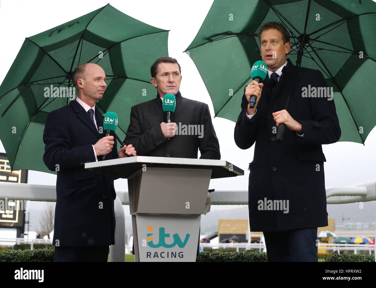 ITV Racing presenter Ed Chamberlin (R) with Sir Anthony McCoy and Luke ...