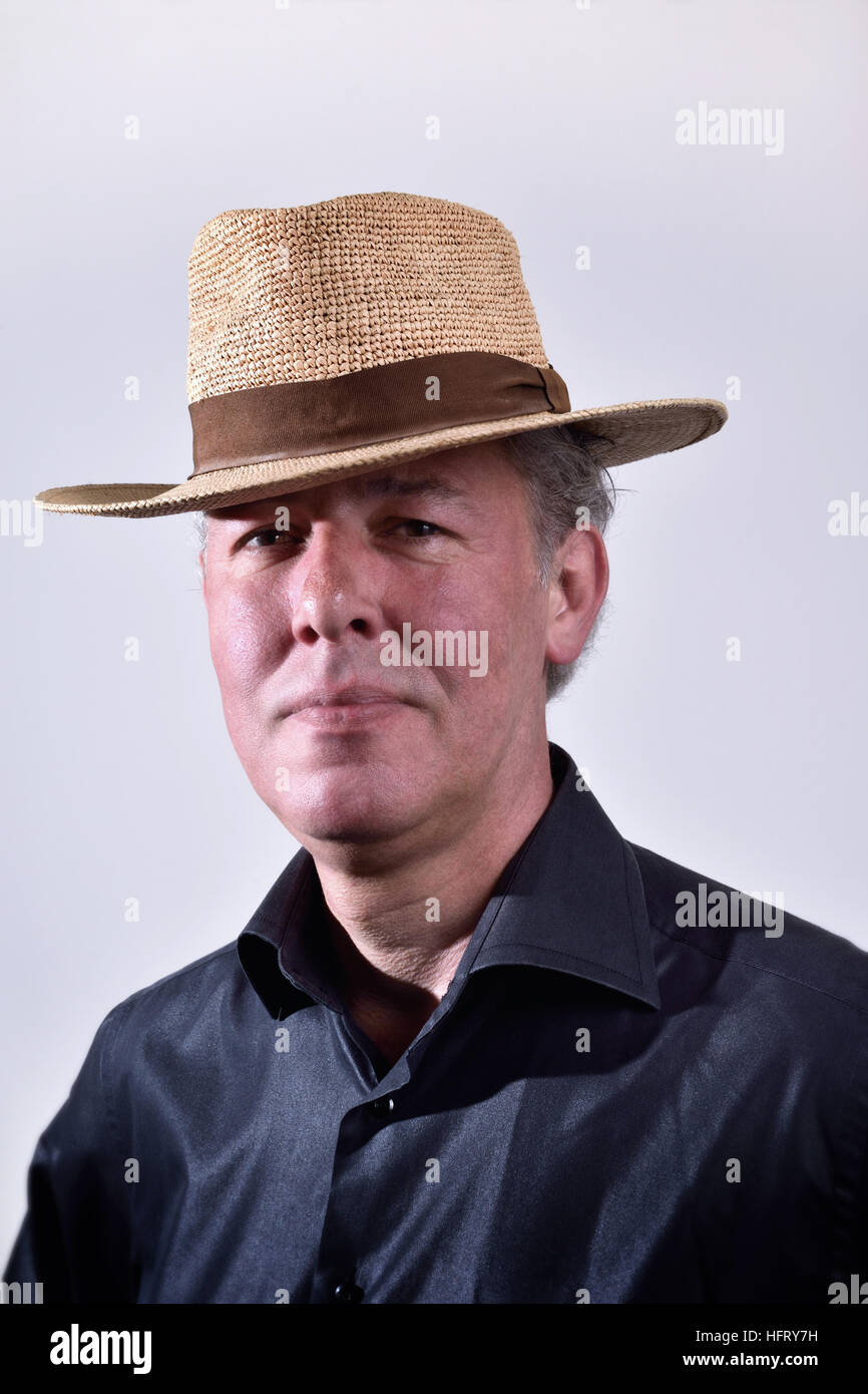 Senior man in check shirt hi-res stock photography and images - Alamy