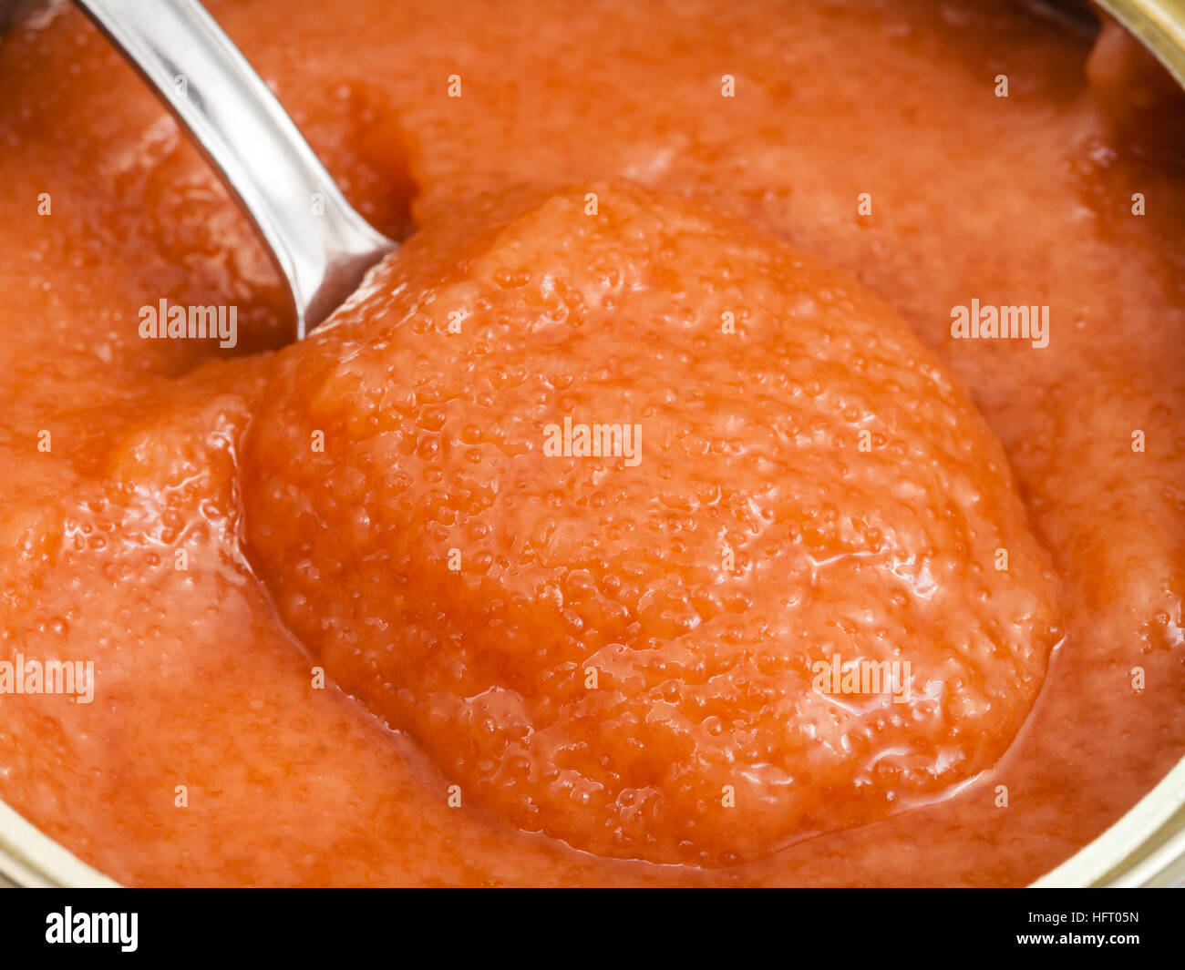 salty caviar of carp fish with spoon in tin close up Stock Photo - Alamy