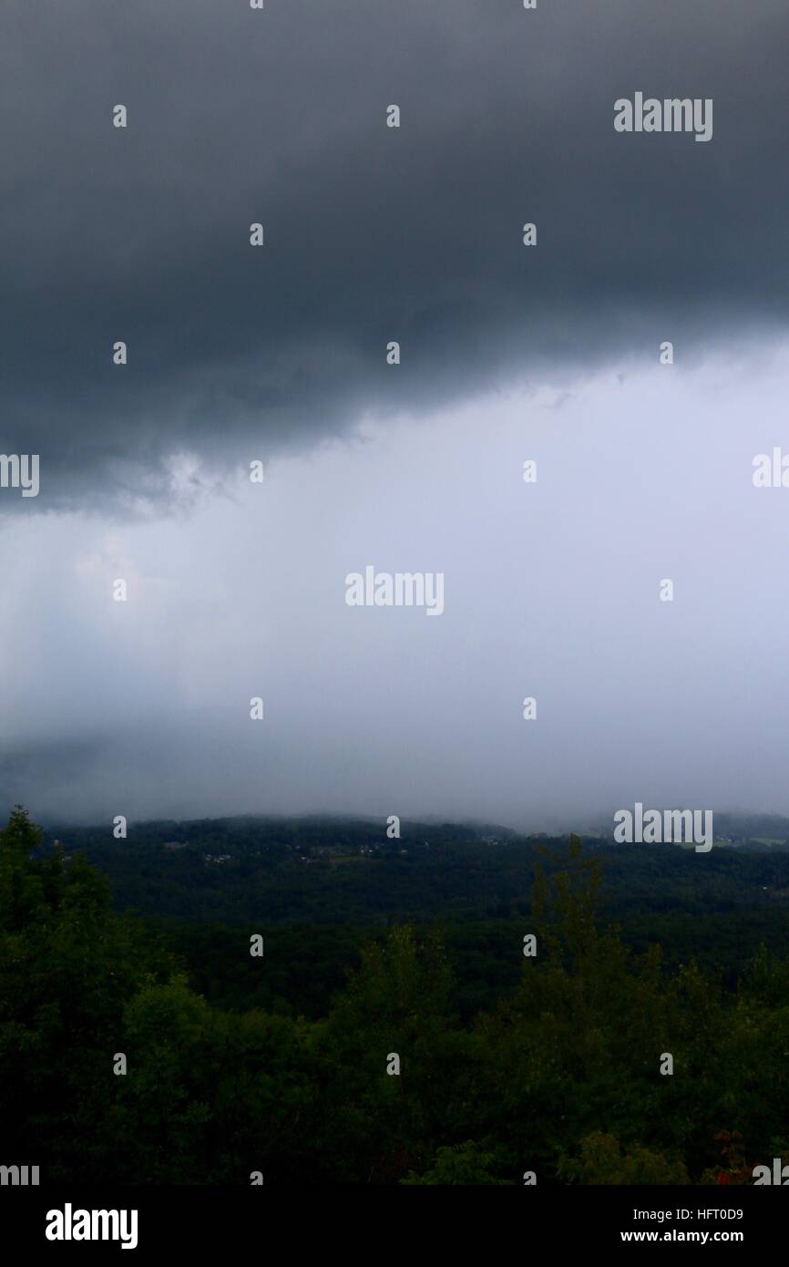 Storm clouds over mountain hi-res stock photography and images - Alamy