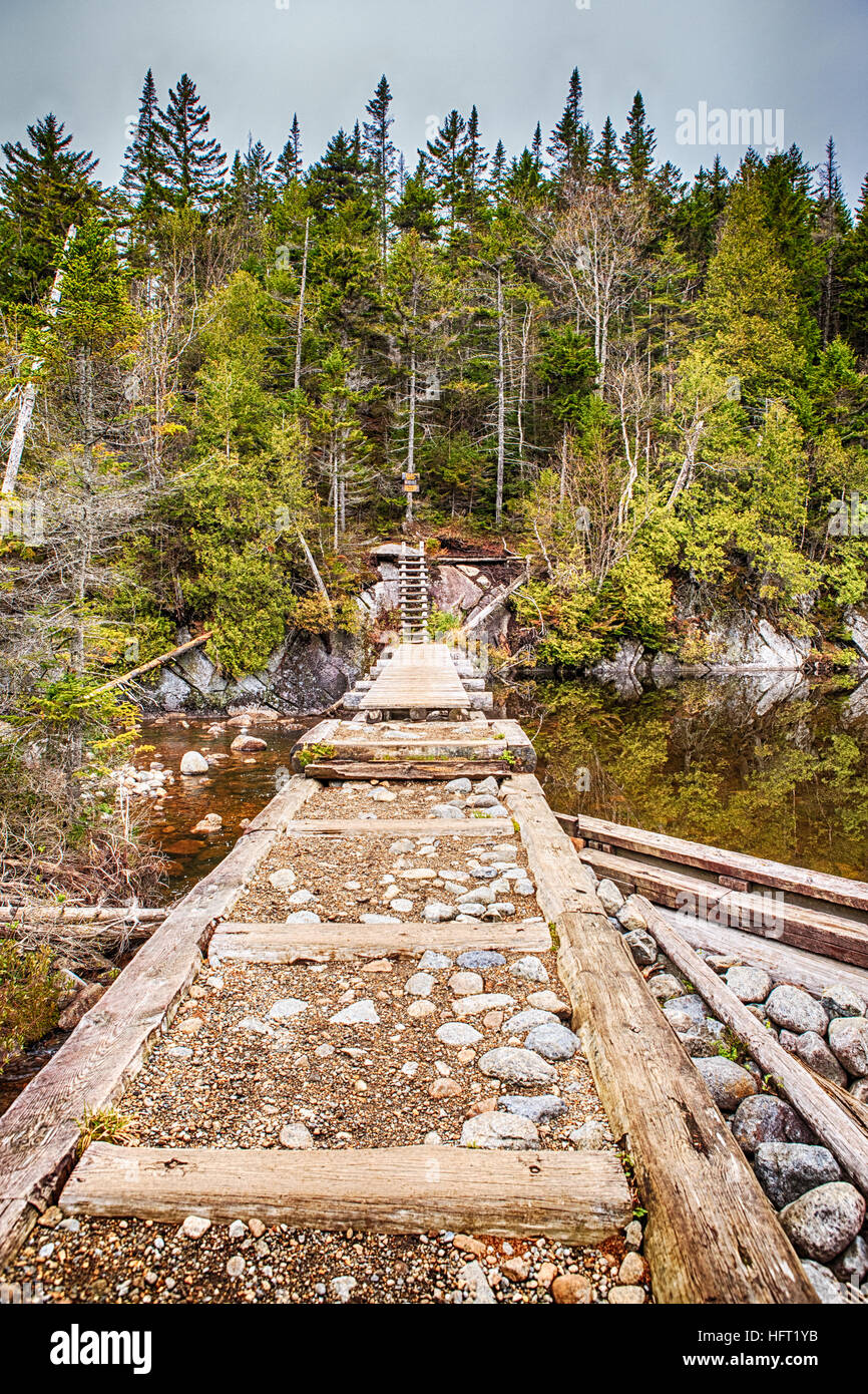 Bridge over a river in a remote area of the Adirondack High Peaks ...