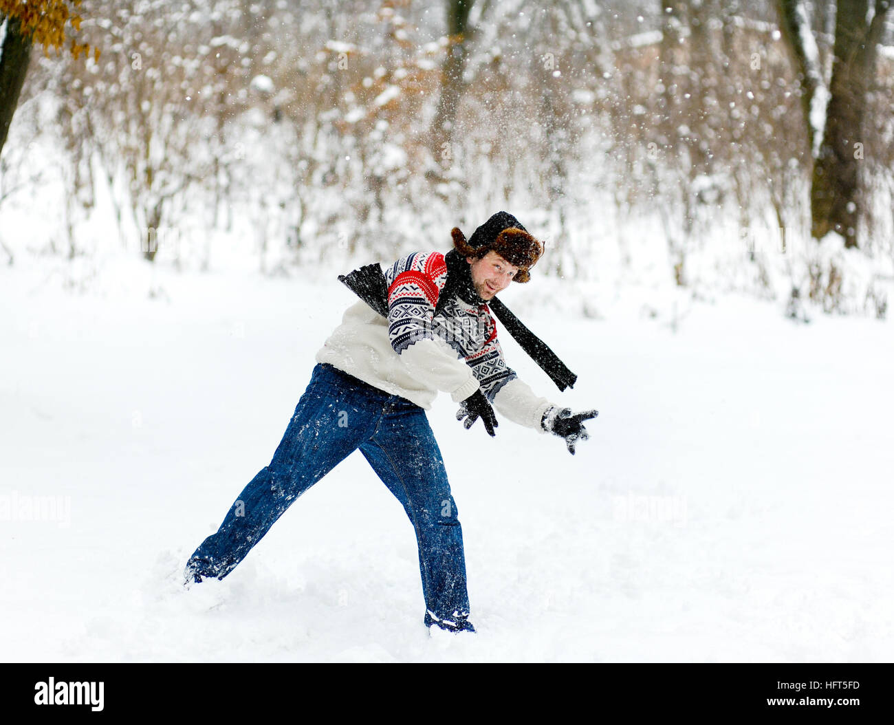 Person throwing snowballs hi-res stock photography and images - Alamy