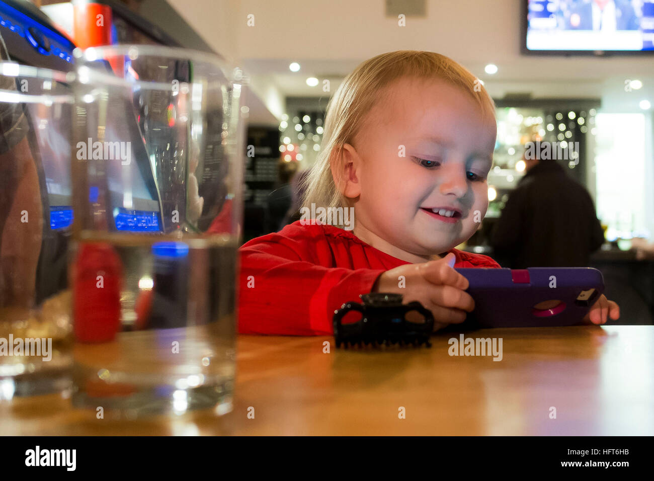 Using smart phone technology hi-res stock photography and images - Alamy