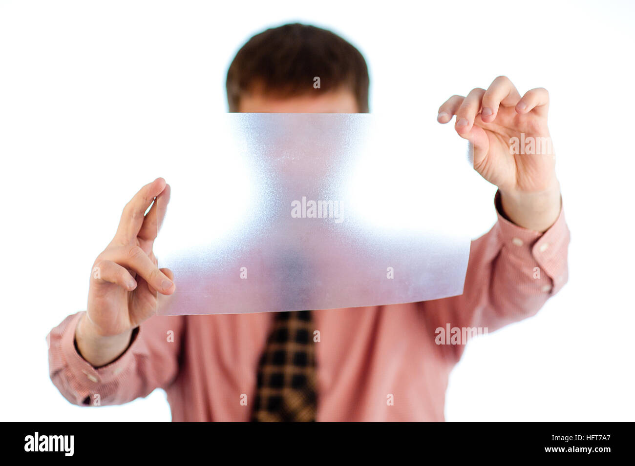 male showing something on transparent paper Stock Photo - Alamy
