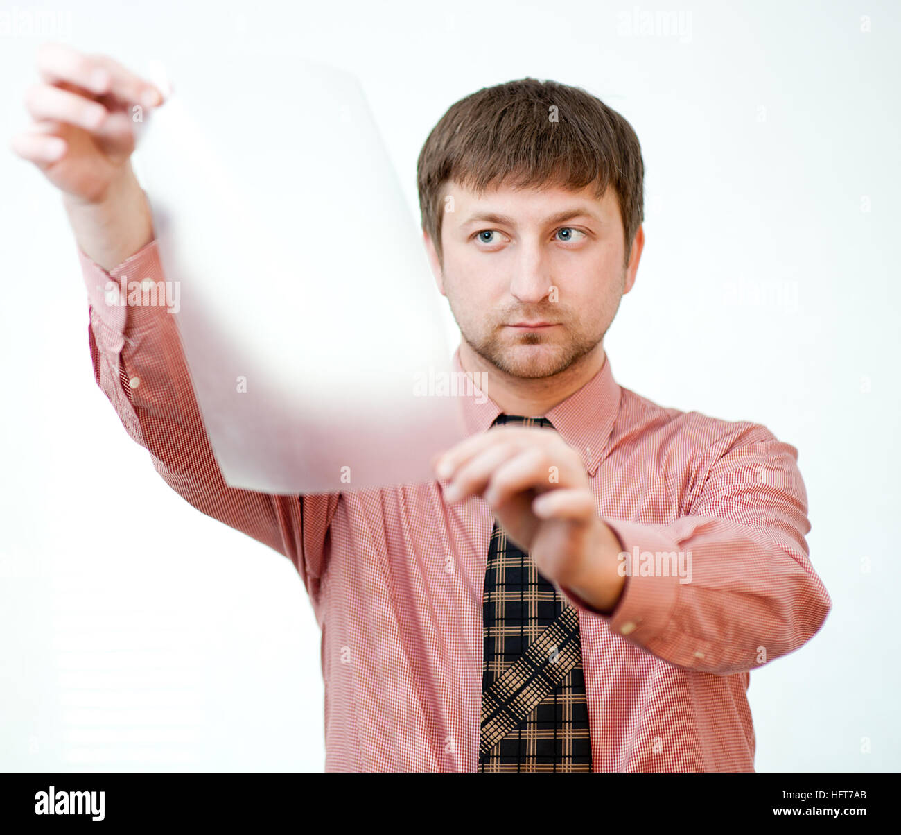 male showing something on transparent paper Stock Photo - Alamy