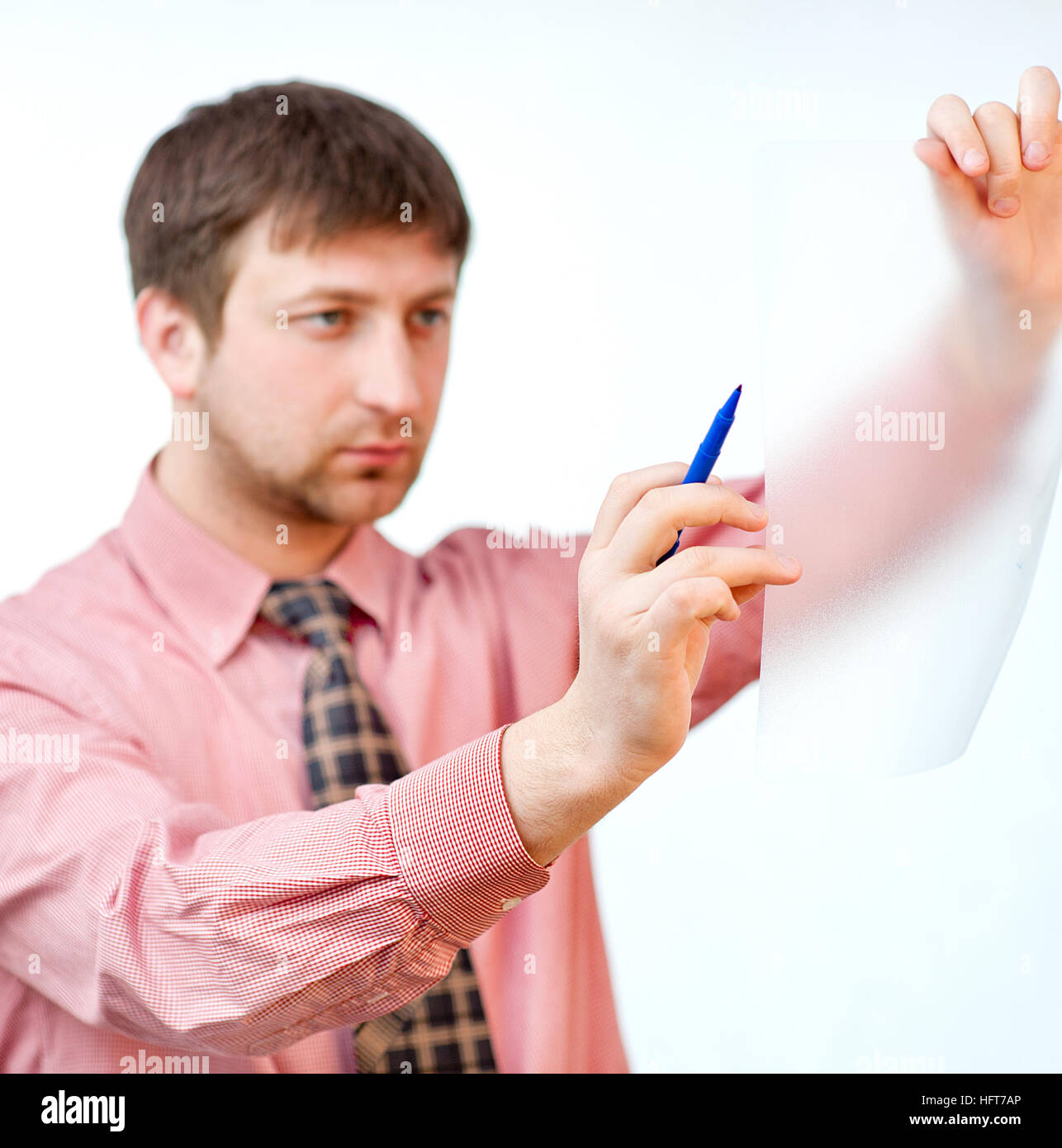 male showing something on transparent paper Stock Photo - Alamy