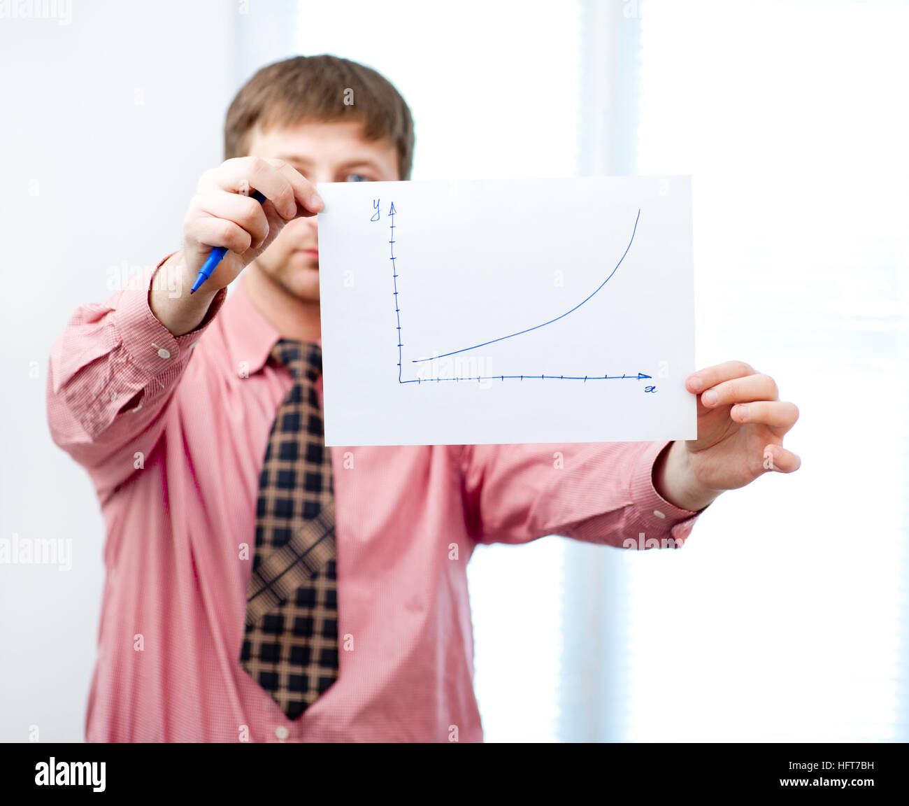 male writing something on transparent paper with Stock Photo - Alamy