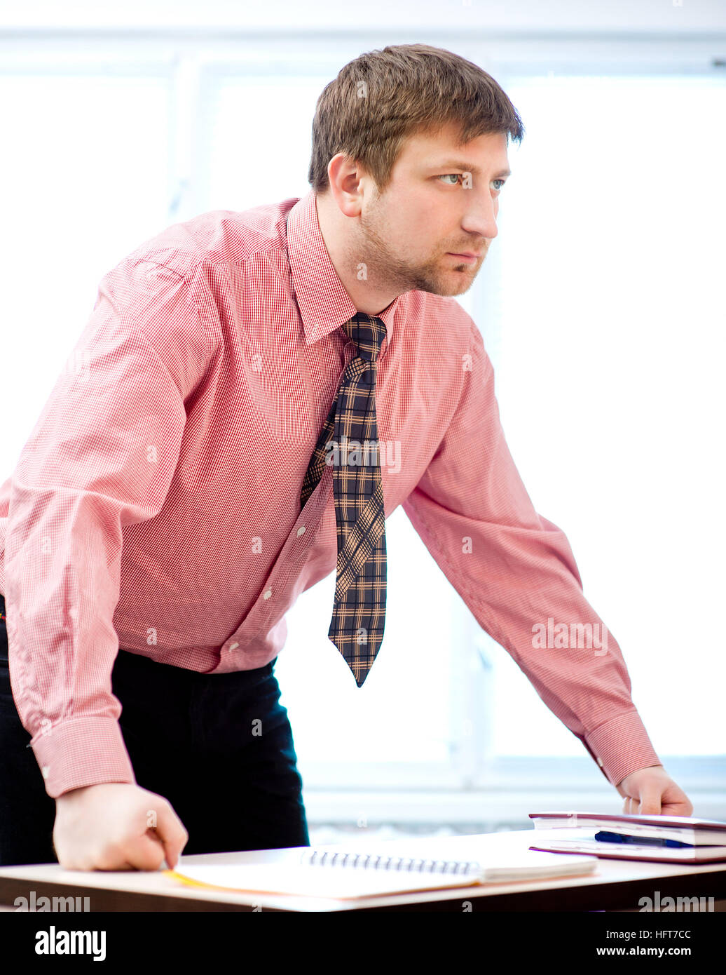 Man leans on table hi-res stock photography and images - Alamy
