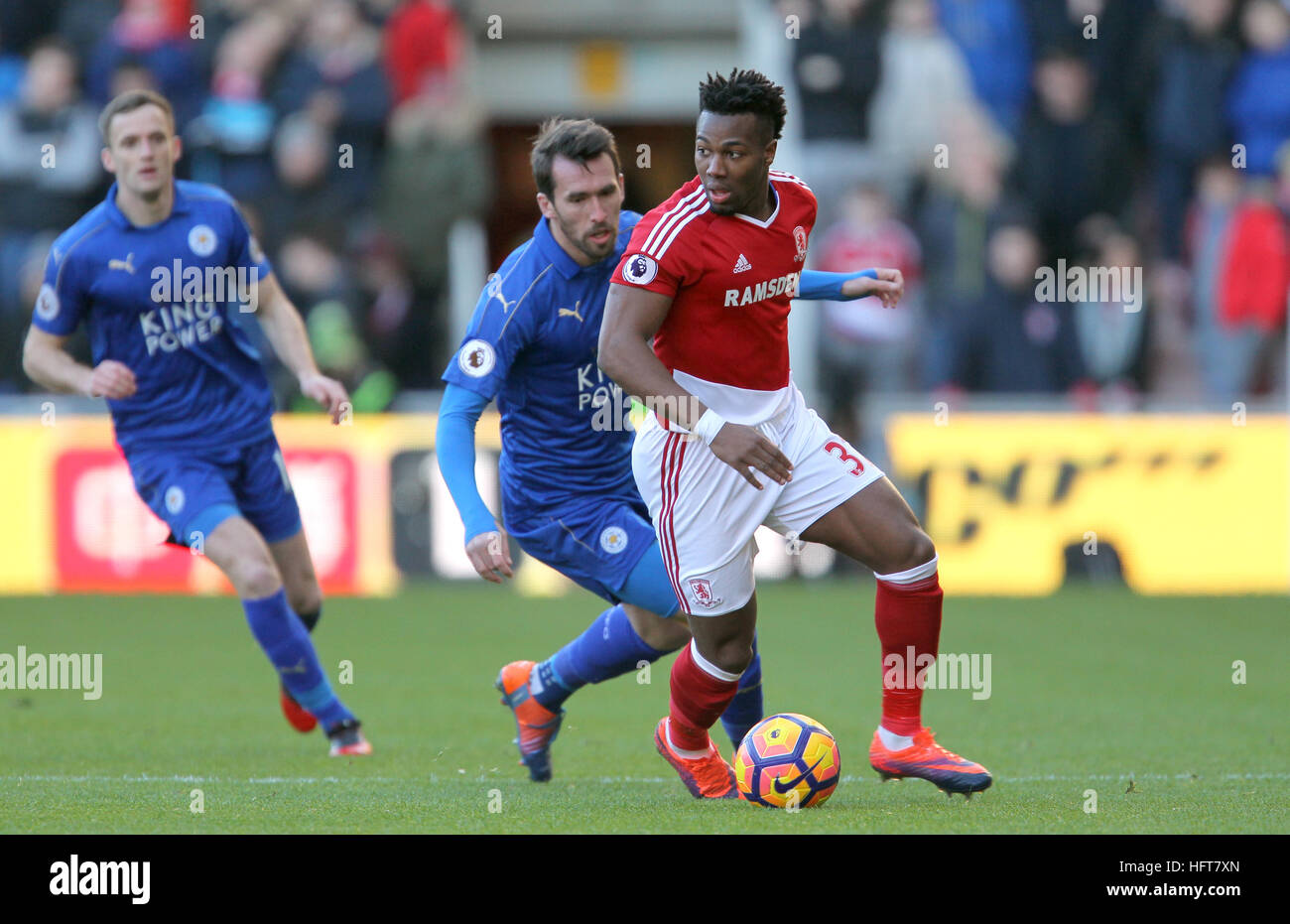 Leicester City's Christian Fuchs (left) and Middlesbrough's Adama ...